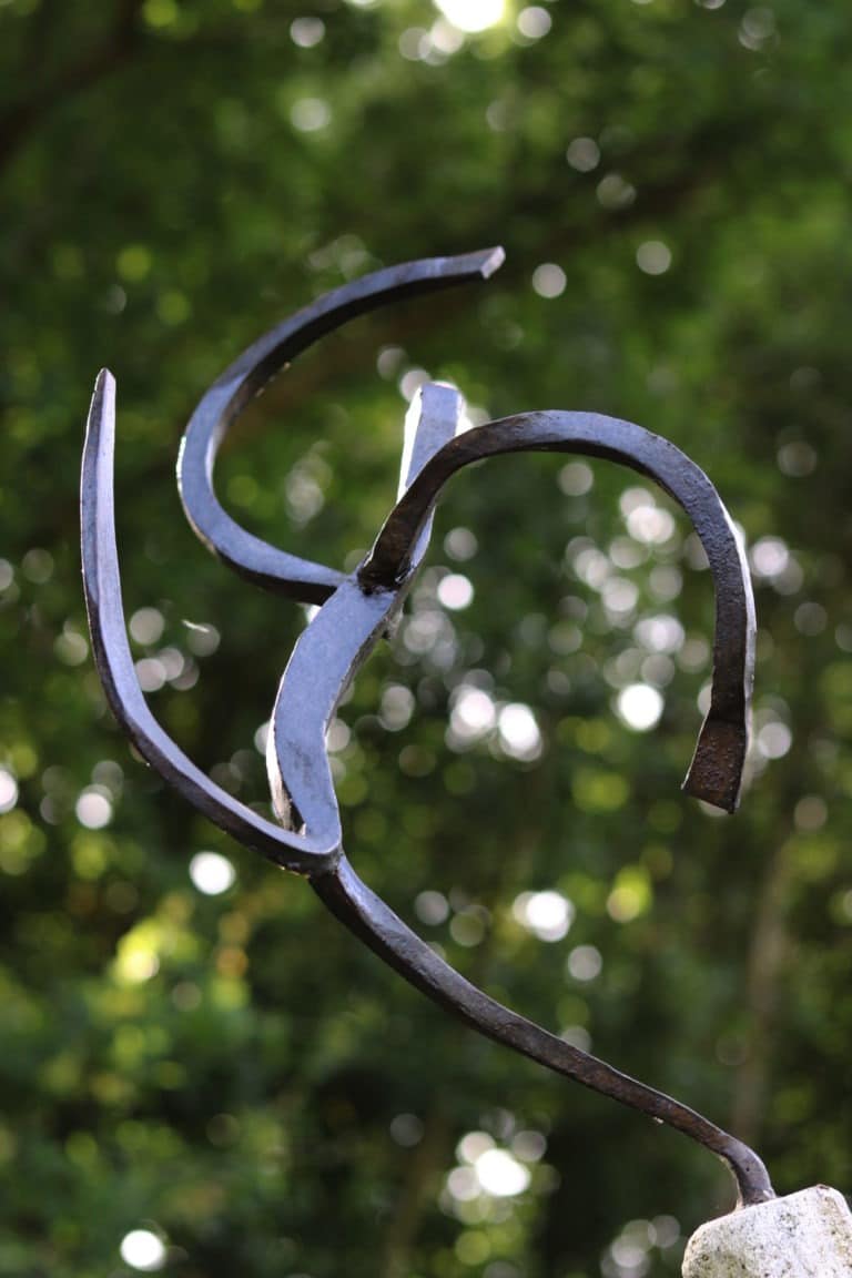 L’homme roue - sculpture en fer forgé | CHOUETTE Galerie